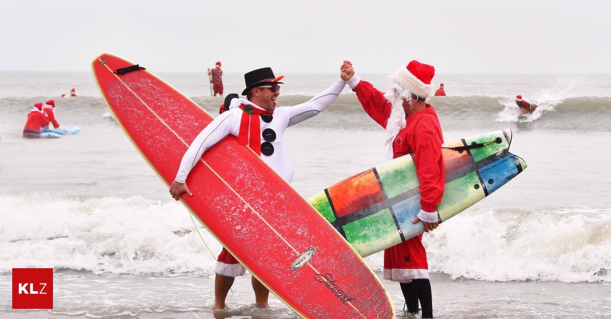 Surfende Weihnachtsmänner sammeln 100.000 US-Dollar Spenden
